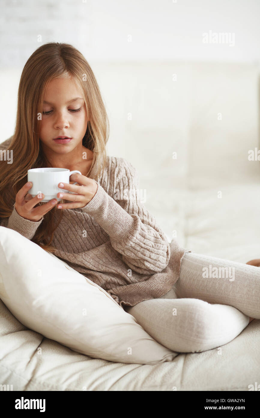Child drinking tea Stock Photo - Alamy