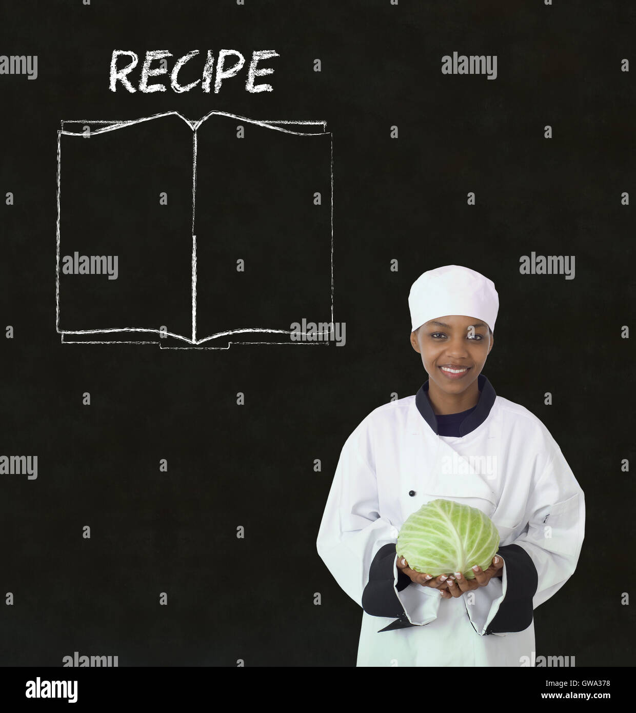 Chef with recipe book on chalk blackboard menu background Stock Photo ...