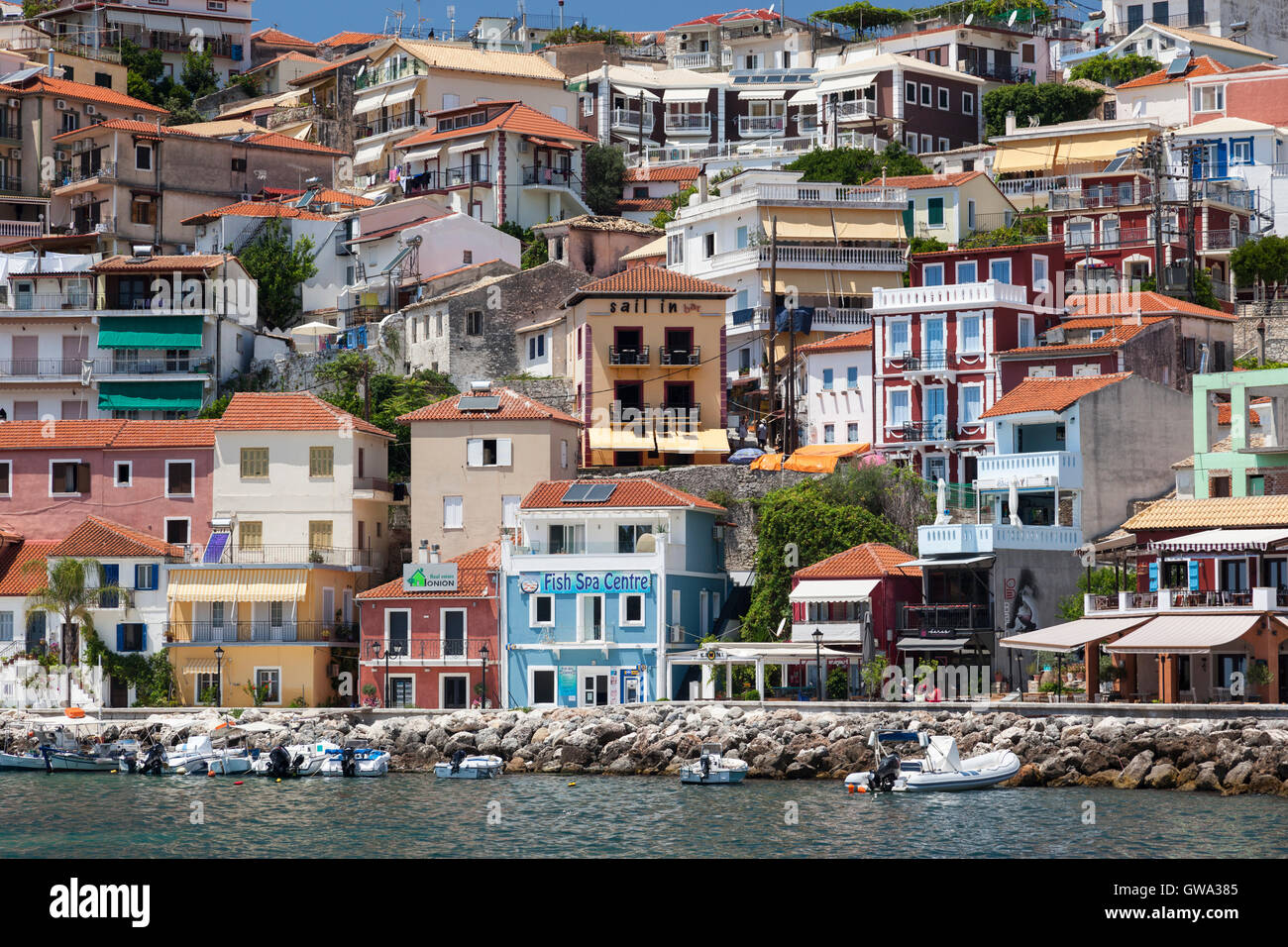Close up of the wonderful hillside colourful houses and bars of Parga ...