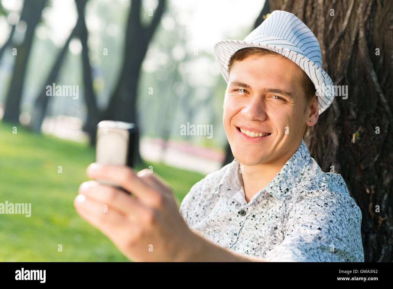 young man with a cell phone Stock Photo - Alamy