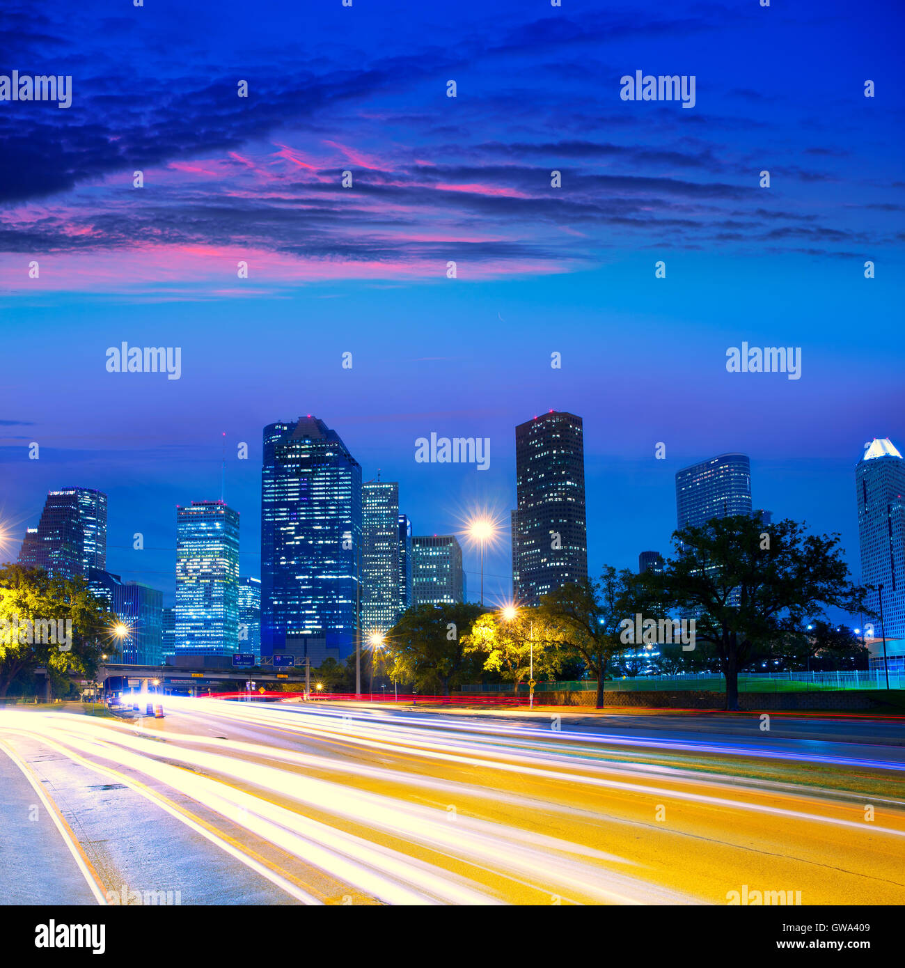 Houston Texas skyline at sunset with traffic lights Stock Photo - Alamy