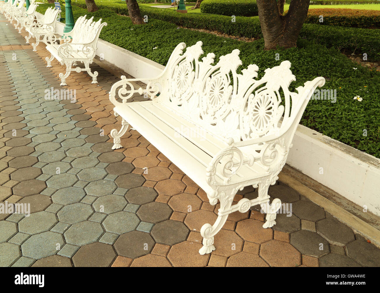 white bench in park Stock Photo - Alamy
