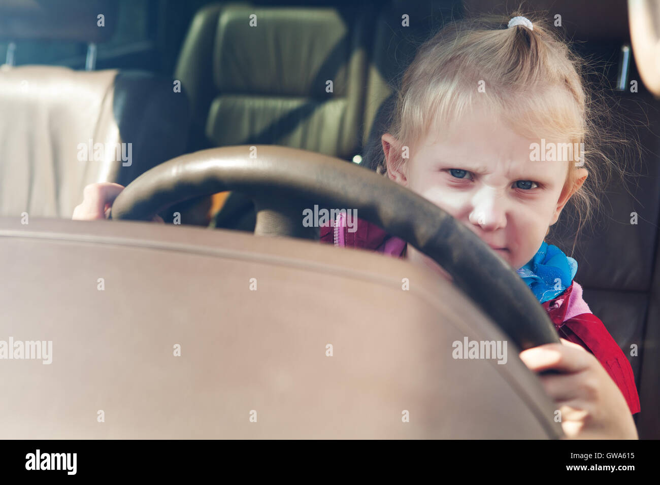 child driving a car Stock Photo - Alamy
