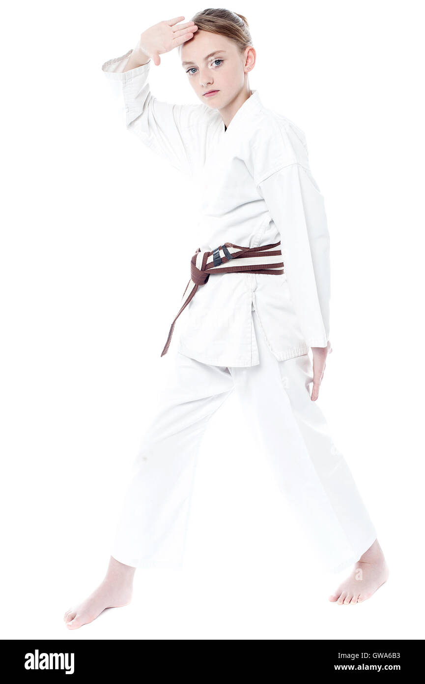 Pretty young girl in karate uniform Stock Photo - Alamy