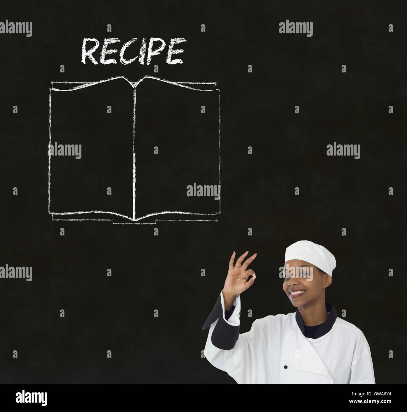 Chef with recipe book on chalk blackboard menu background Stock Photo ...
