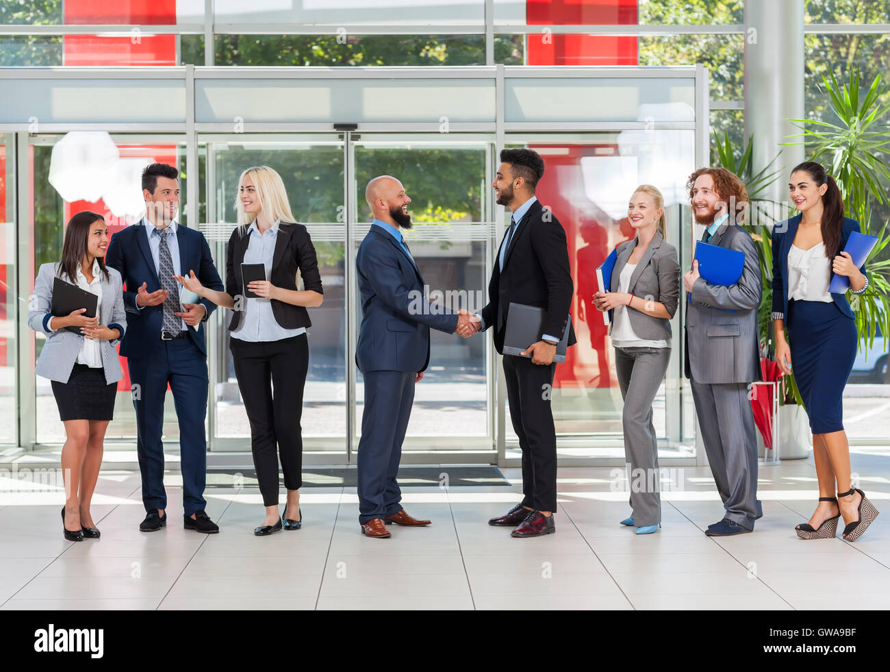 Business People Group Boss Hand Shake Welcome Gesture In Modern Office ...