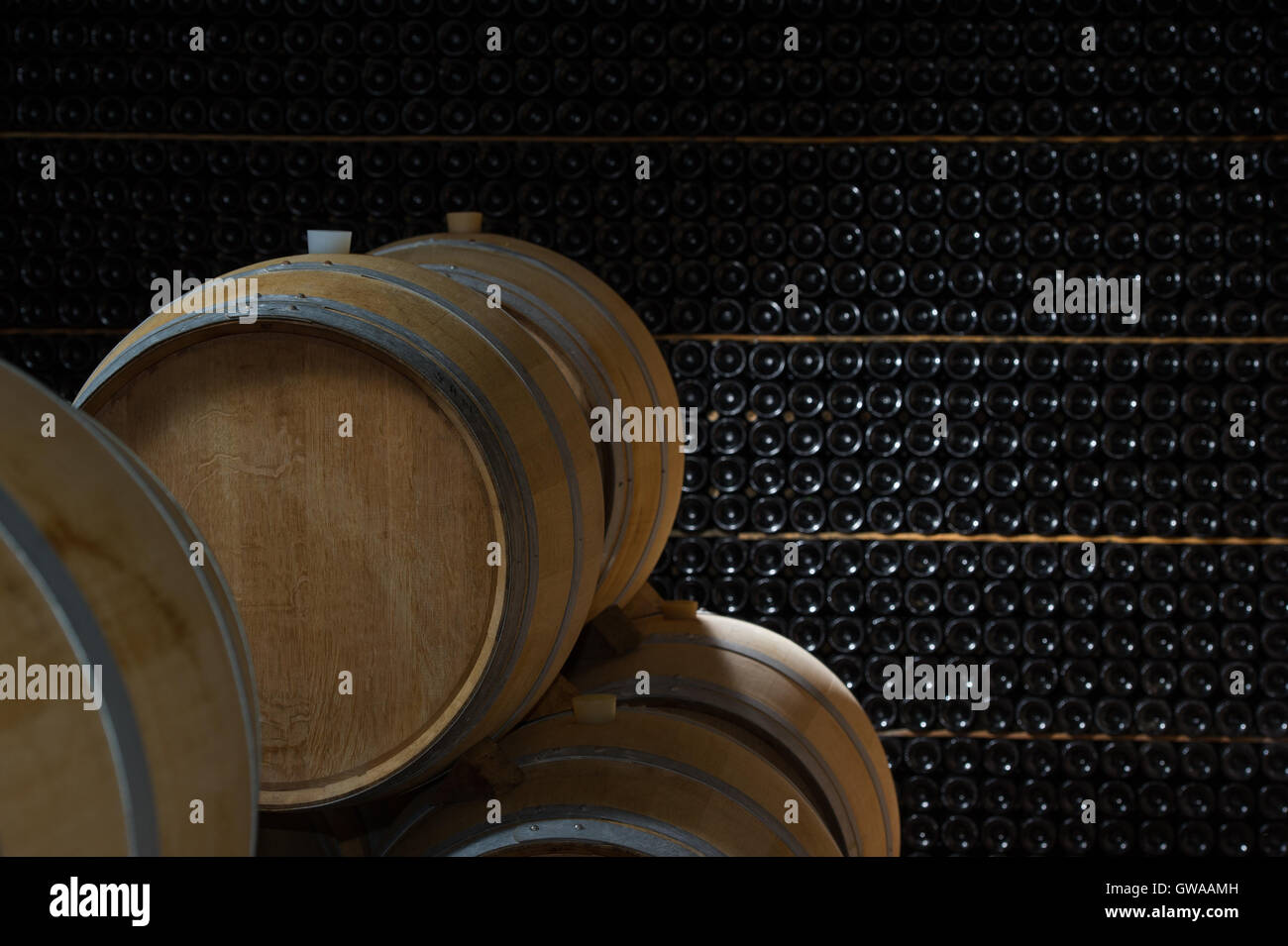 Underground wine cellar, Wooden barrels, bottles storage, Bordeaux ...