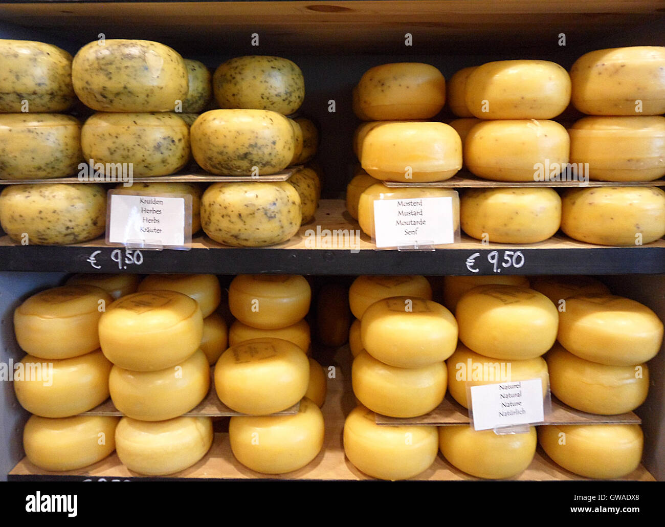 Variety of Dutch Round Cheeses on the Shelf Stock Photo - Alamy