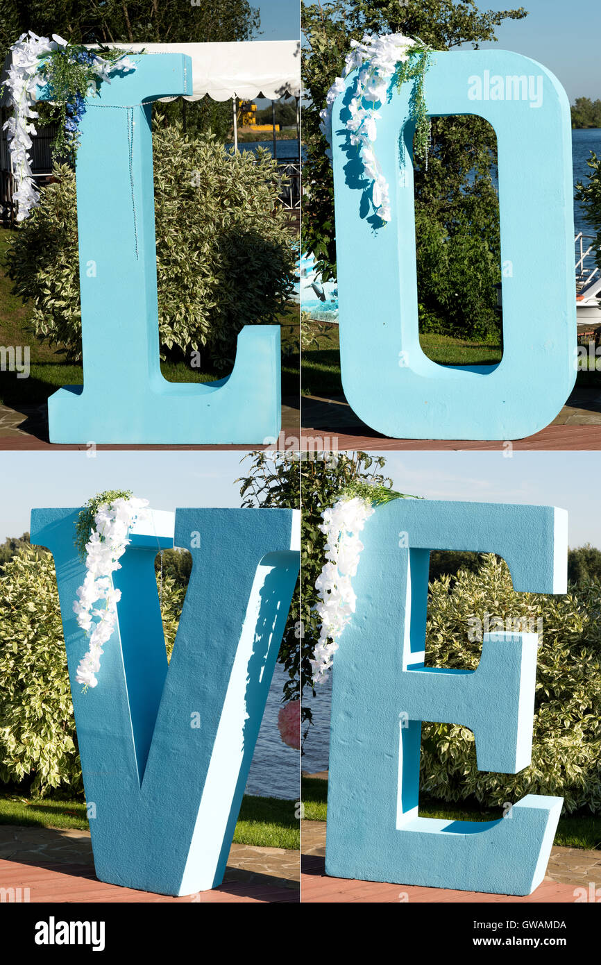 A collage of large turquoise letters in the word love Stock Photo - Alamy