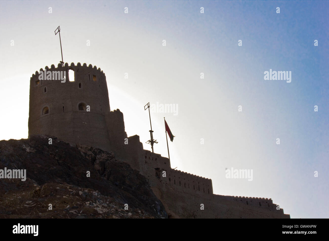 Historic tower in Muscat, Oman. An isolated towers trough rocks Stock ...