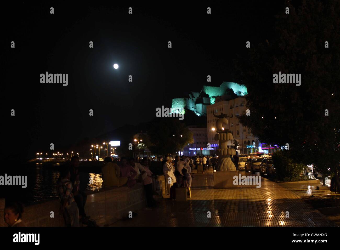 Muscat at Night. Night view of Oman capital at night, in its Corniche ...