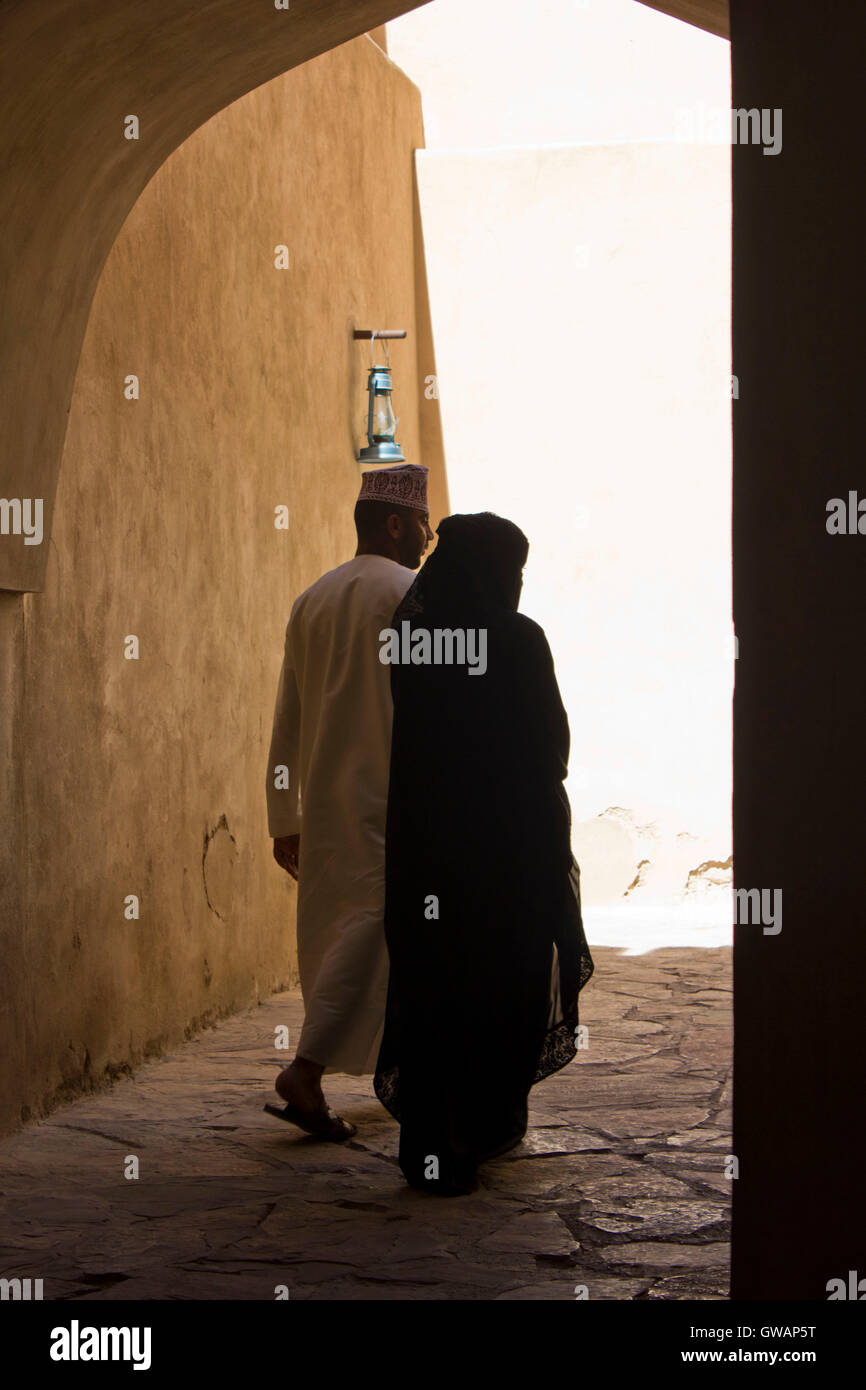 Couple of muslims in Nizwa Fort Castle, Oman Stock Photo - Alamy