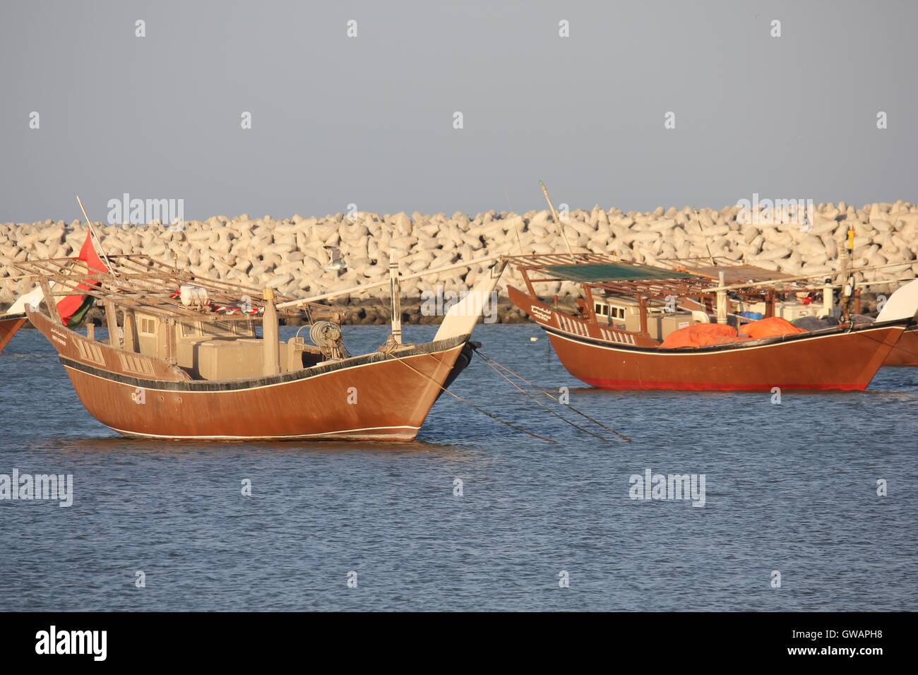 Traditional fishermen's wooden boat floating on the Arabian Sea. Image ...