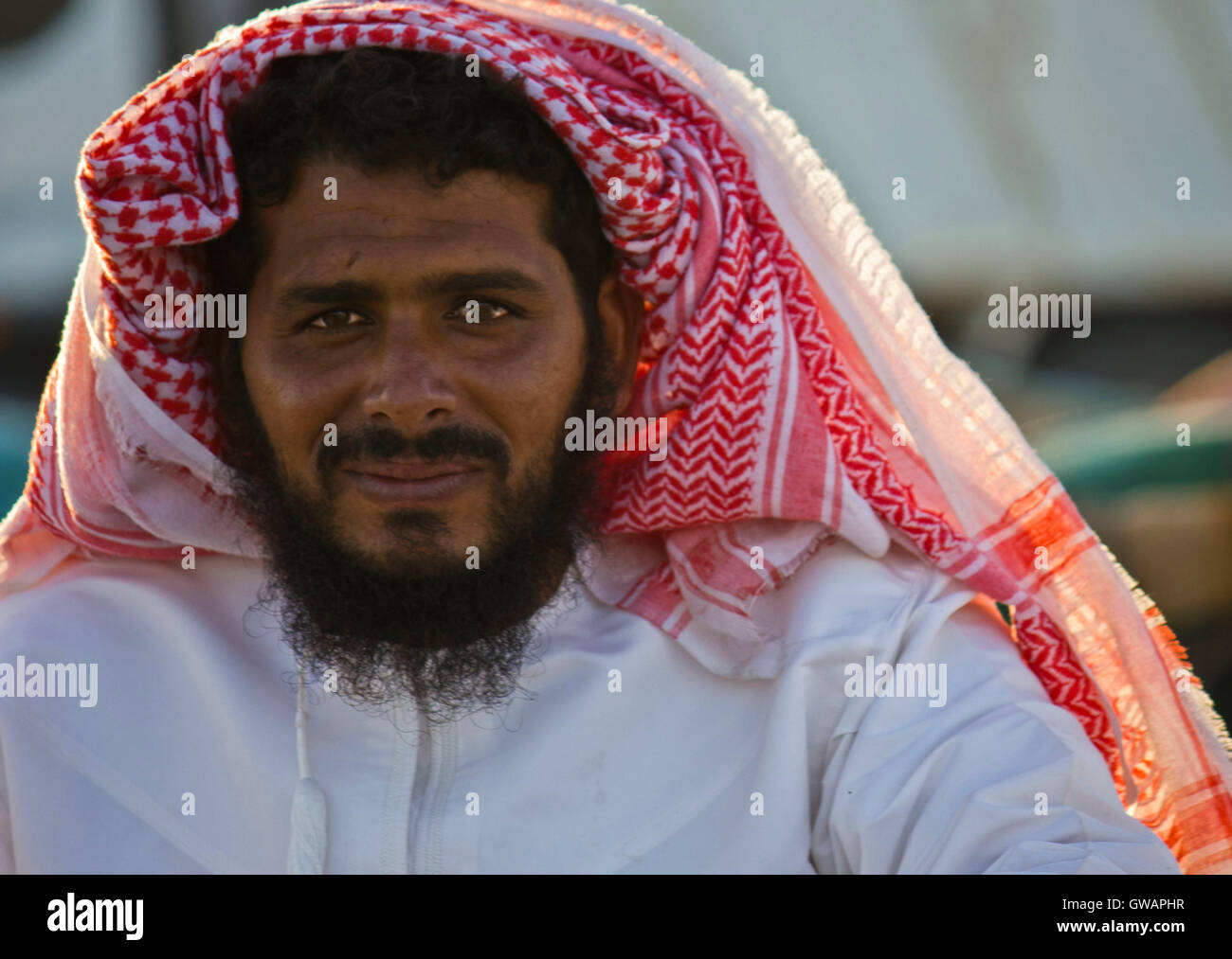 Moqul, Oman, October 22, 2013: Omani man with typical dress. He is ...