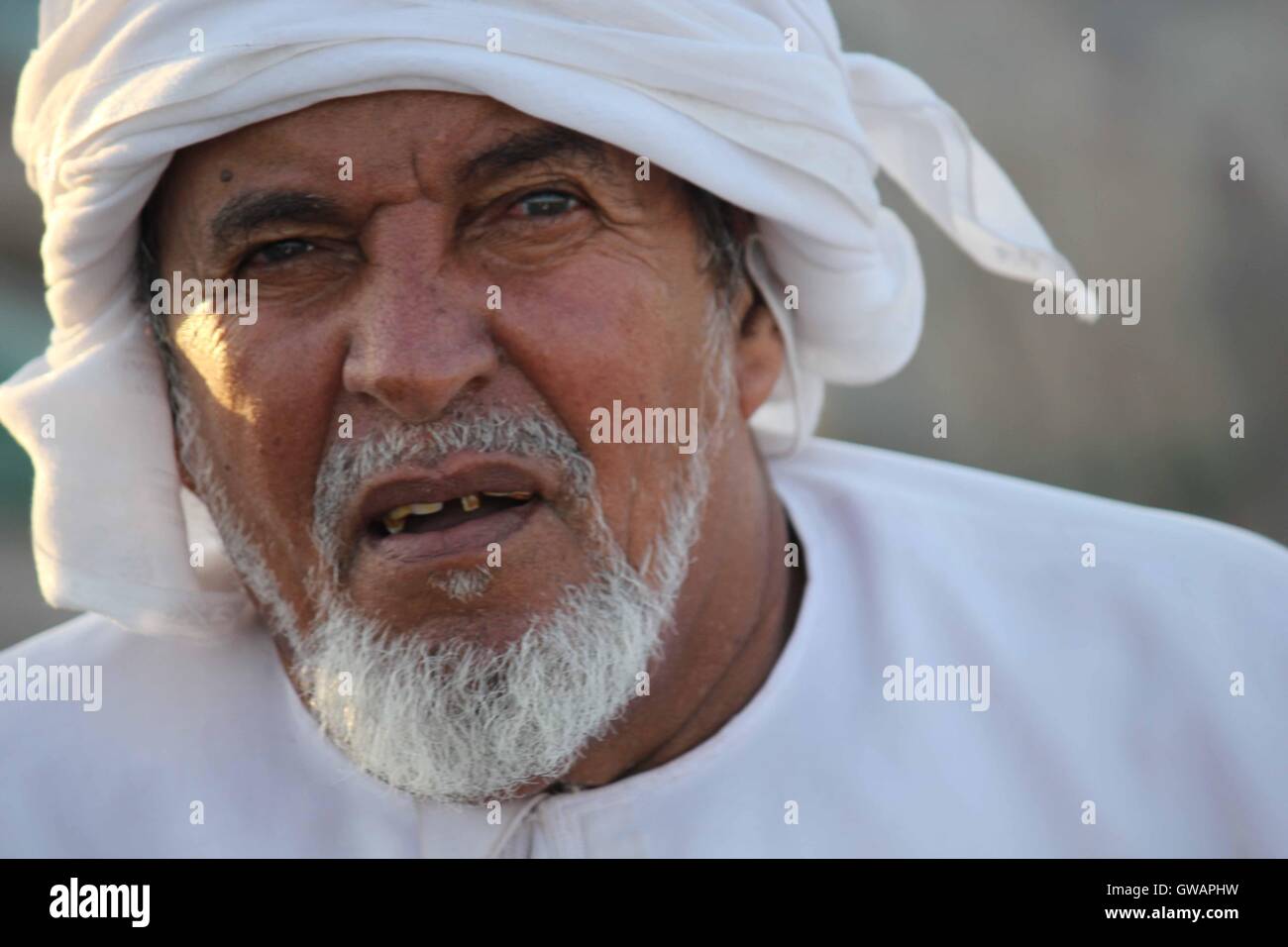 Moqul, Oman, October 22, 2013: Omani man with typical dress. He is ...