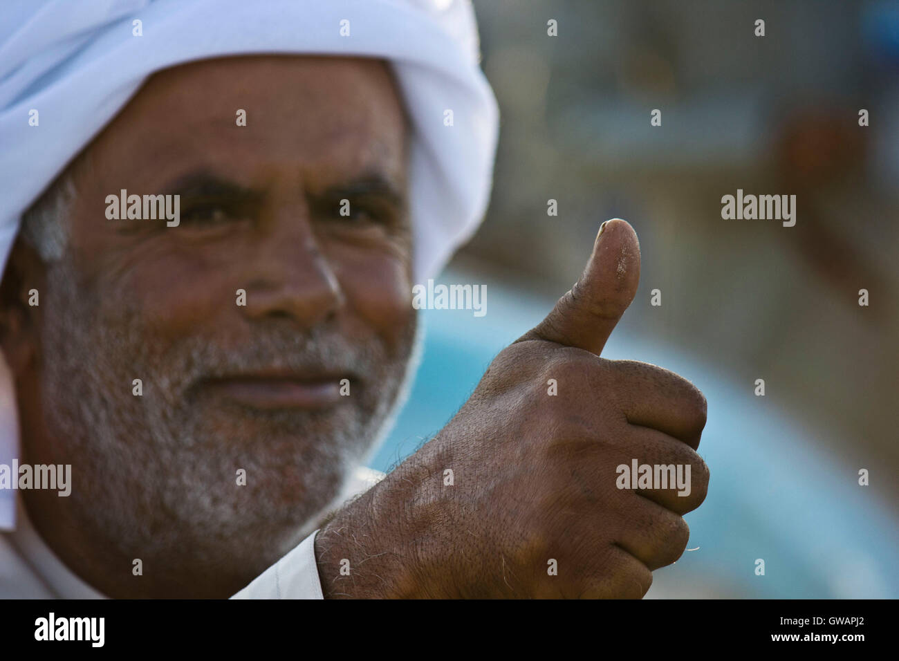 Moqul, Oman, October 22, 2013: Omani man with typical dress. He is ...