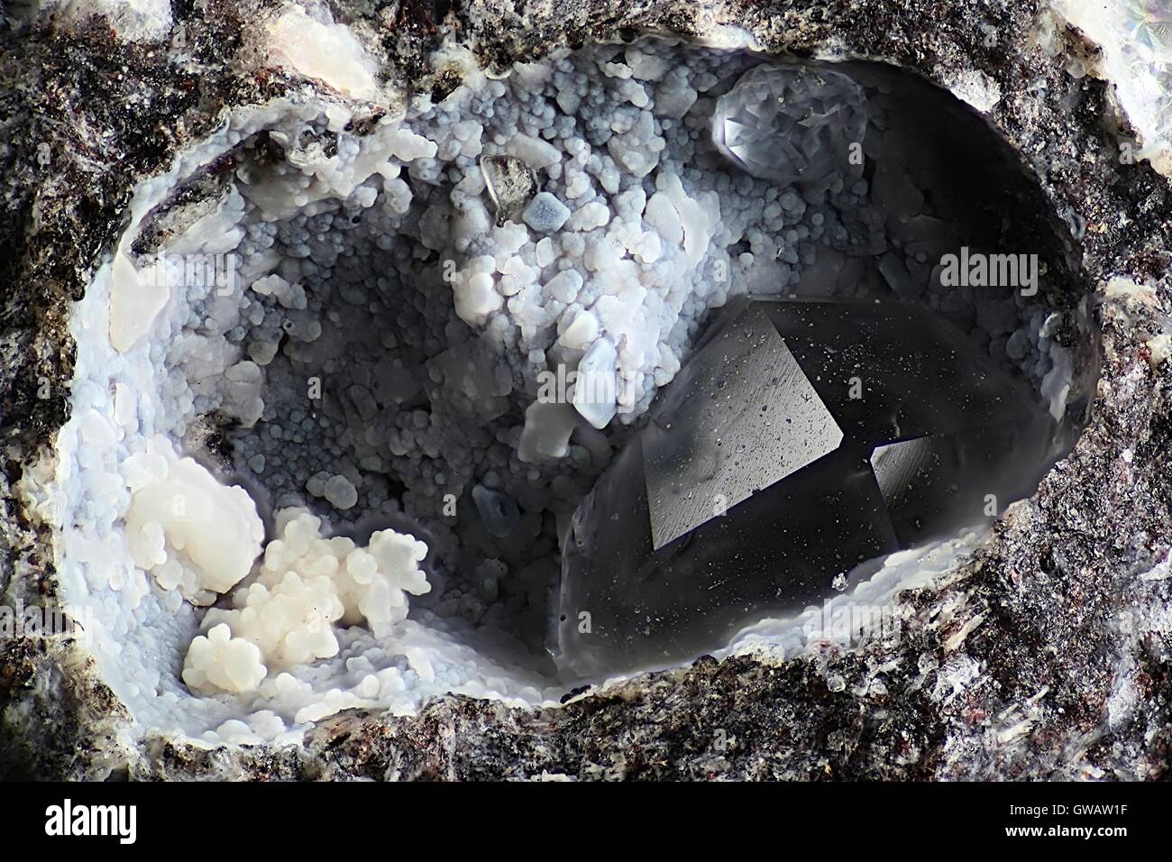 Crystal of analcime in a vug in volcanic basalt Stock Photo - Alamy
