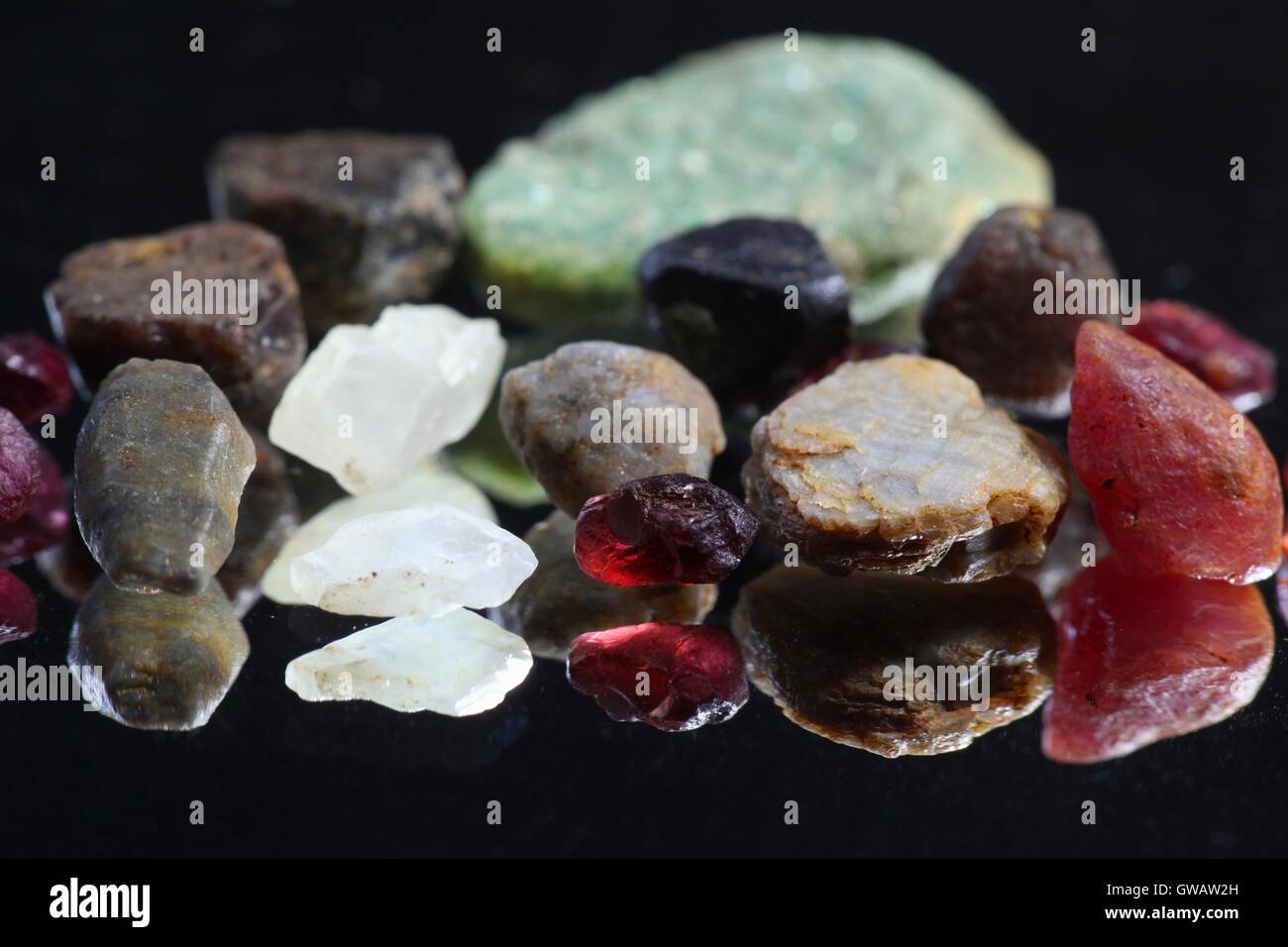 Uncut and raw gem crystals Stock Photo - Alamy