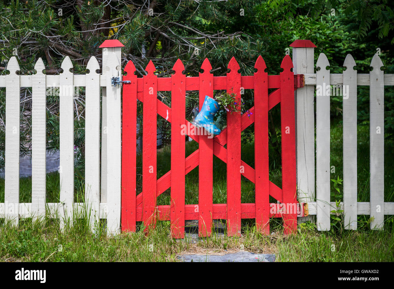 A red gate in the village of Freshwater, Newfoundland and Labrador ...