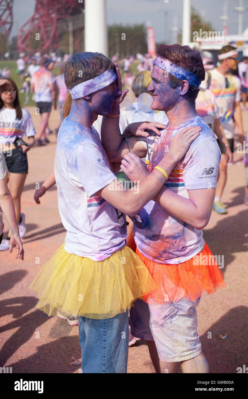 Tow participants of The Color Run wearing tutus, Stratford, London, UK ...