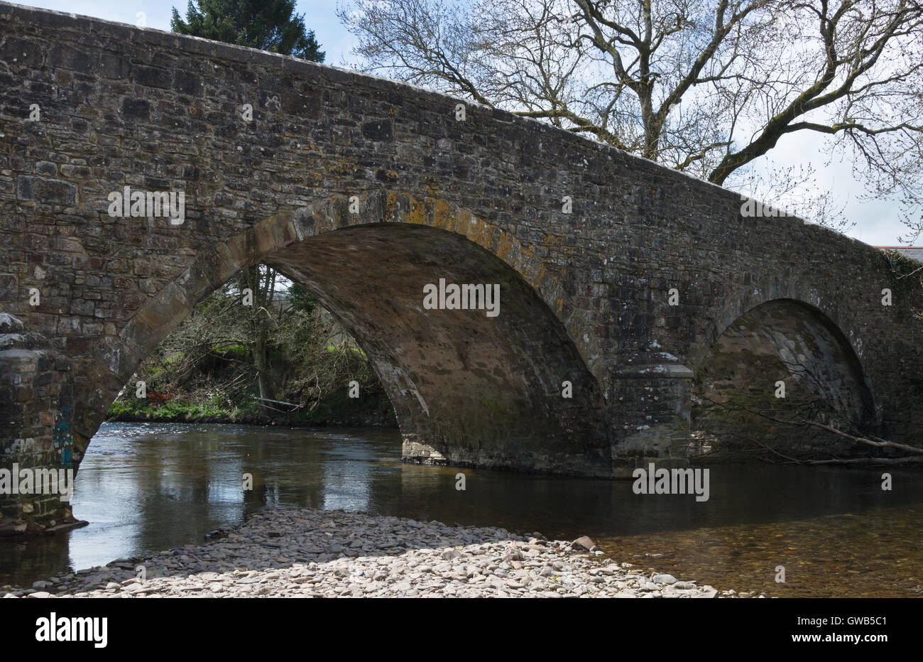 Looking through the arches of the road bridge over the river Exe in the ...
