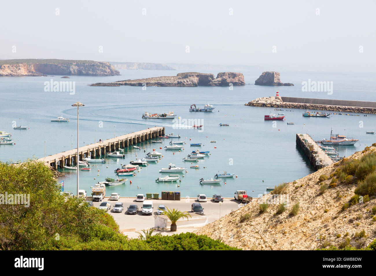 Sagres harbour and fishing boats, and the Martinhal islands, Sagres ...