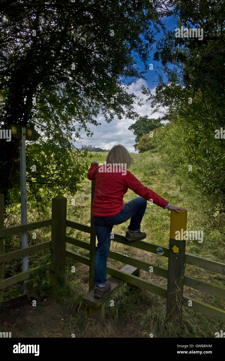 middle age woman climbing style on country walk public footpath Stock ...