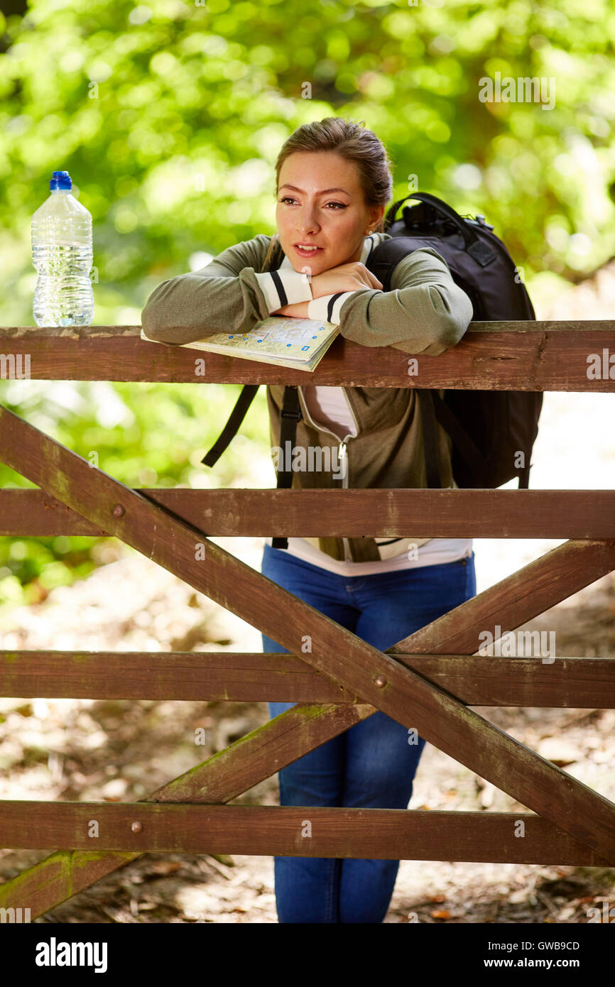 Woman walking in countryside Stock Photo - Alamy