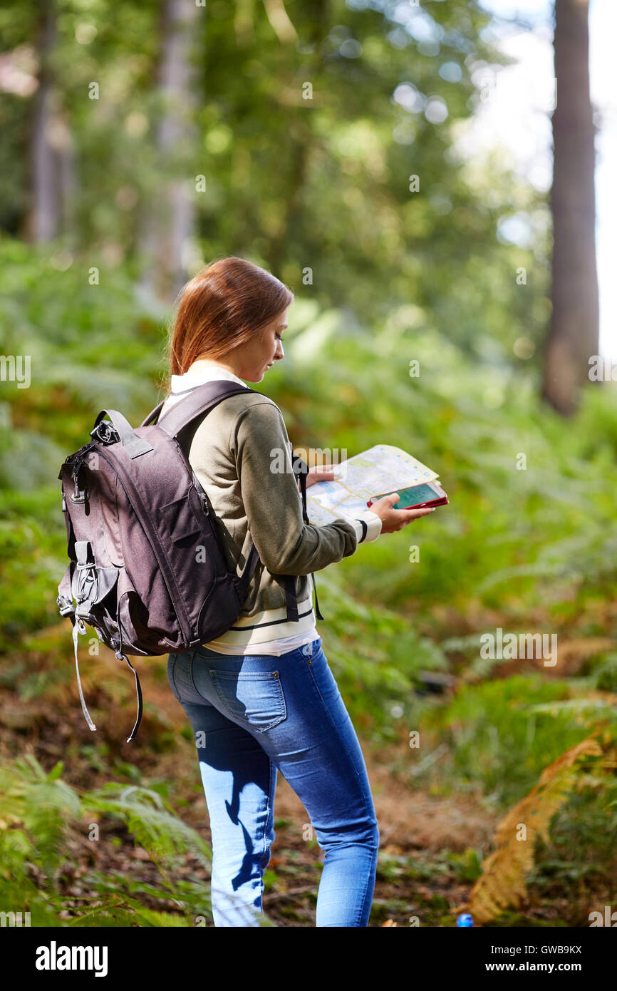 Woman walking in countryside Stock Photo - Alamy