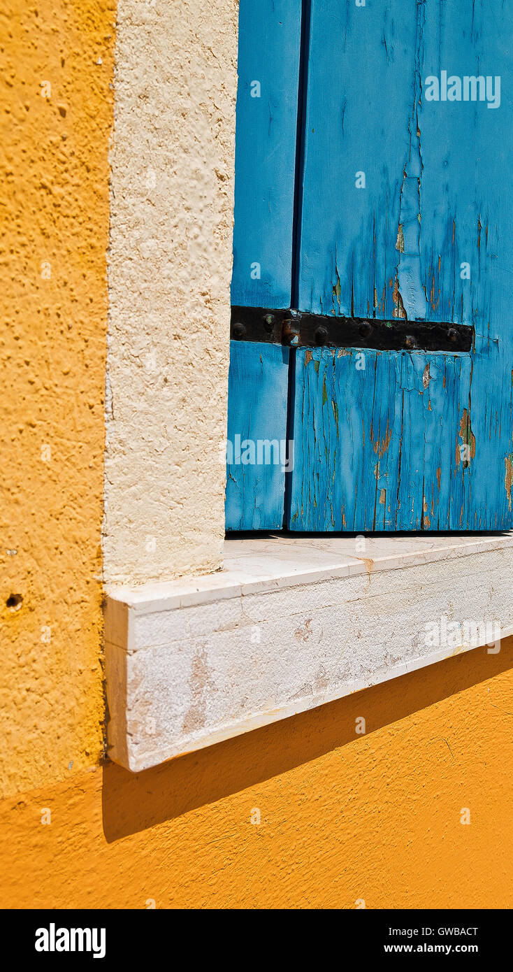 Corner of window and shutter in bright colors Stock Photo - Alamy