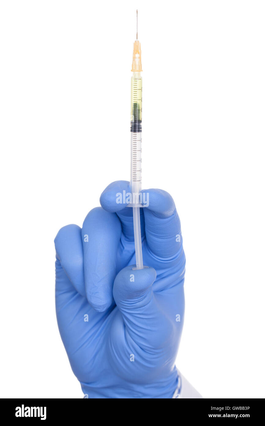 Doctors hand in glove holding syringe ready for injection isolated on a ...