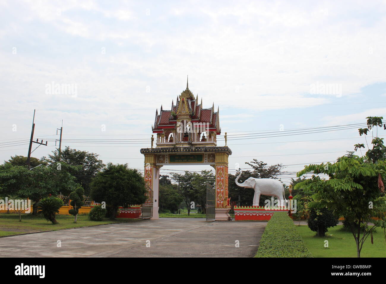 Asian gates and white elephant statue, Phuket Botanic Garden, Thailand ...