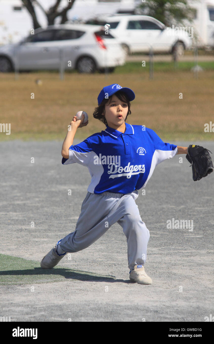 A young boy pitches during a Rookie Ball baseball game in Cairns ...