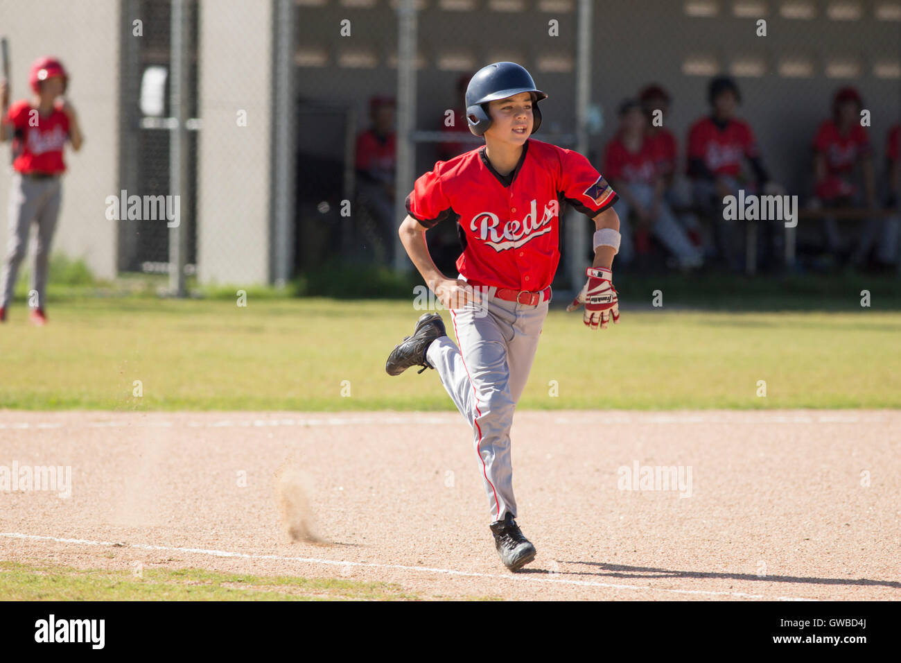 Teen baseball boy running base hi-res stock photography and images - Alamy