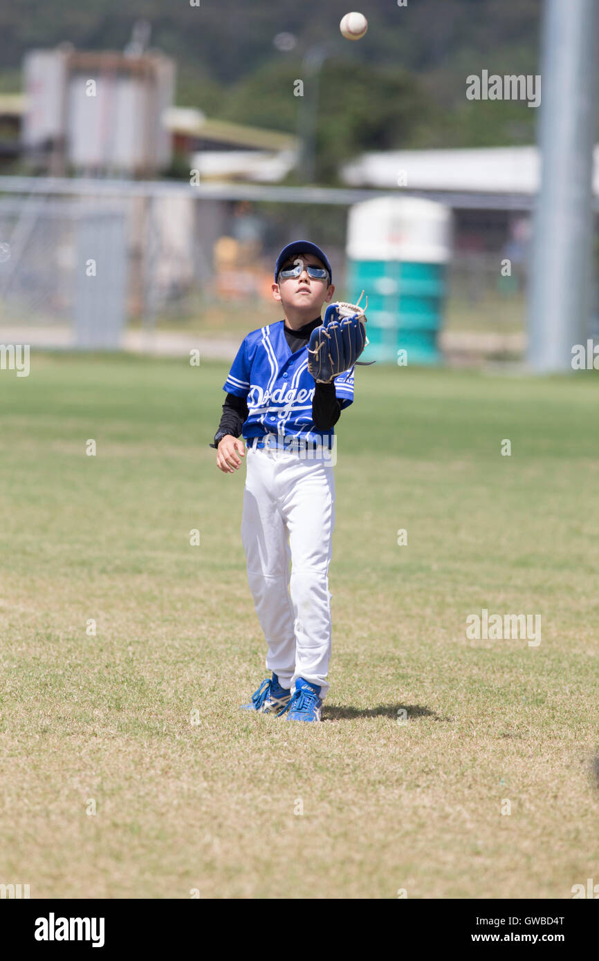 Kids baseball fly ball hi-res stock photography and images - Alamy