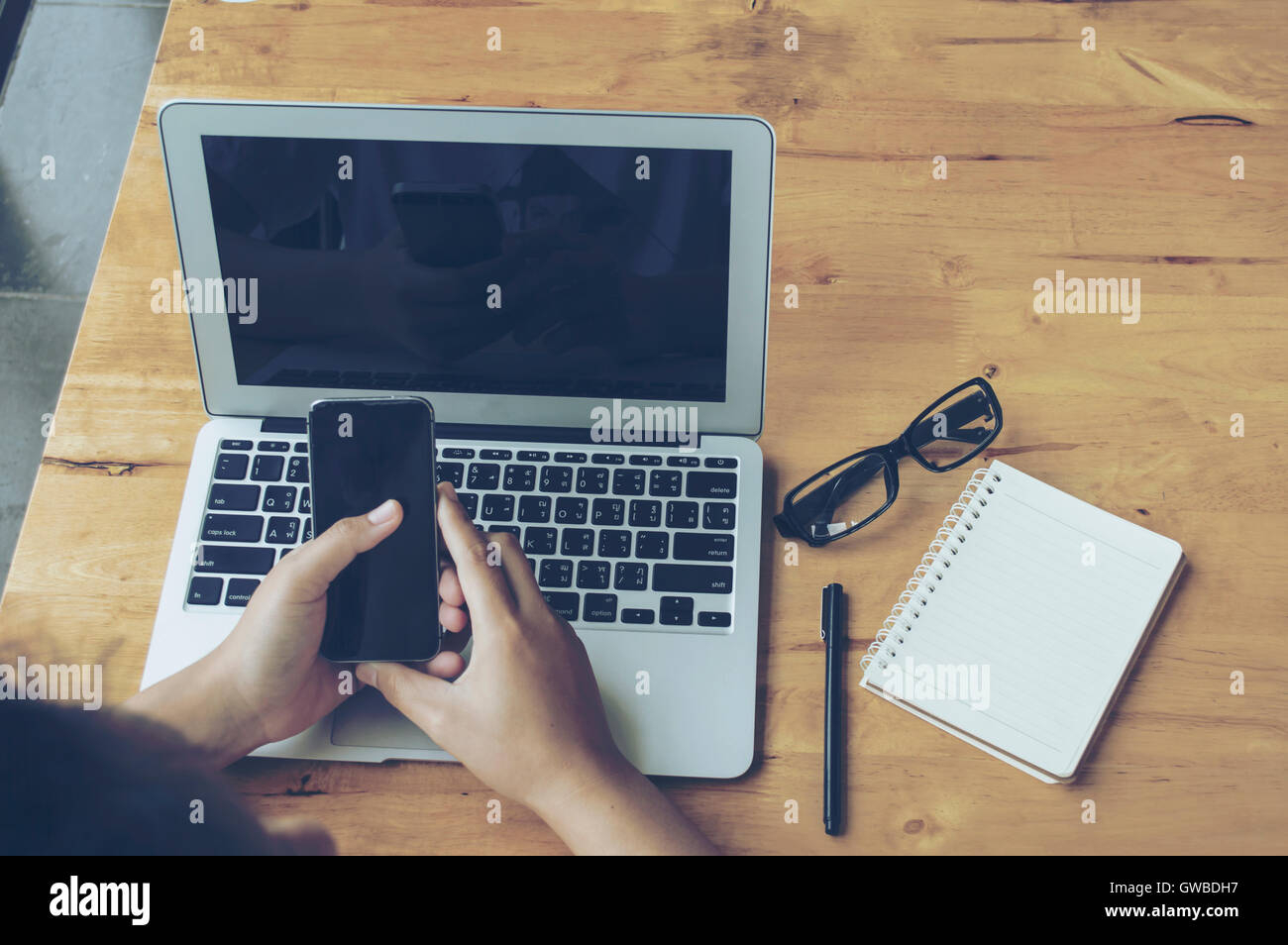 the image of woman's hands using smart phone,laptop in office Stock ...