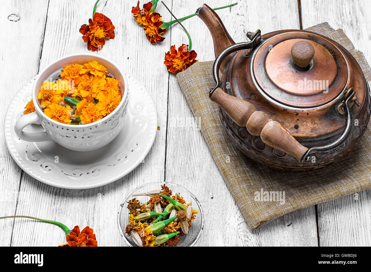 Cup of medicinal tea from the flowers of marigold Stock Photo - Alamy