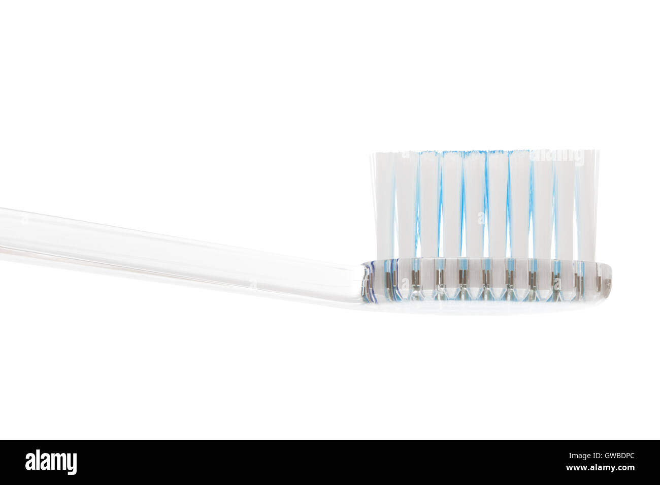 new toothbrush close-up on a white background Stock Photo - Alamy