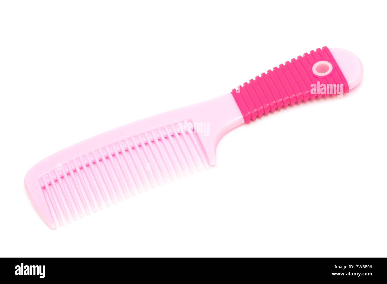 pink plastic comb on a white background Stock Photo - Alamy