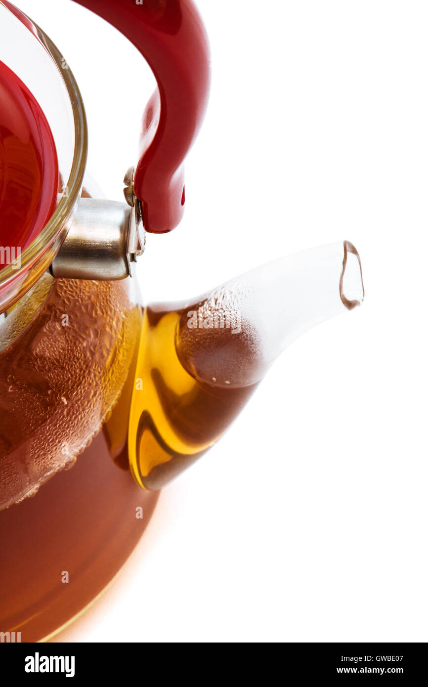 Beautiful glass teapot on a white background Stock Photo - Alamy