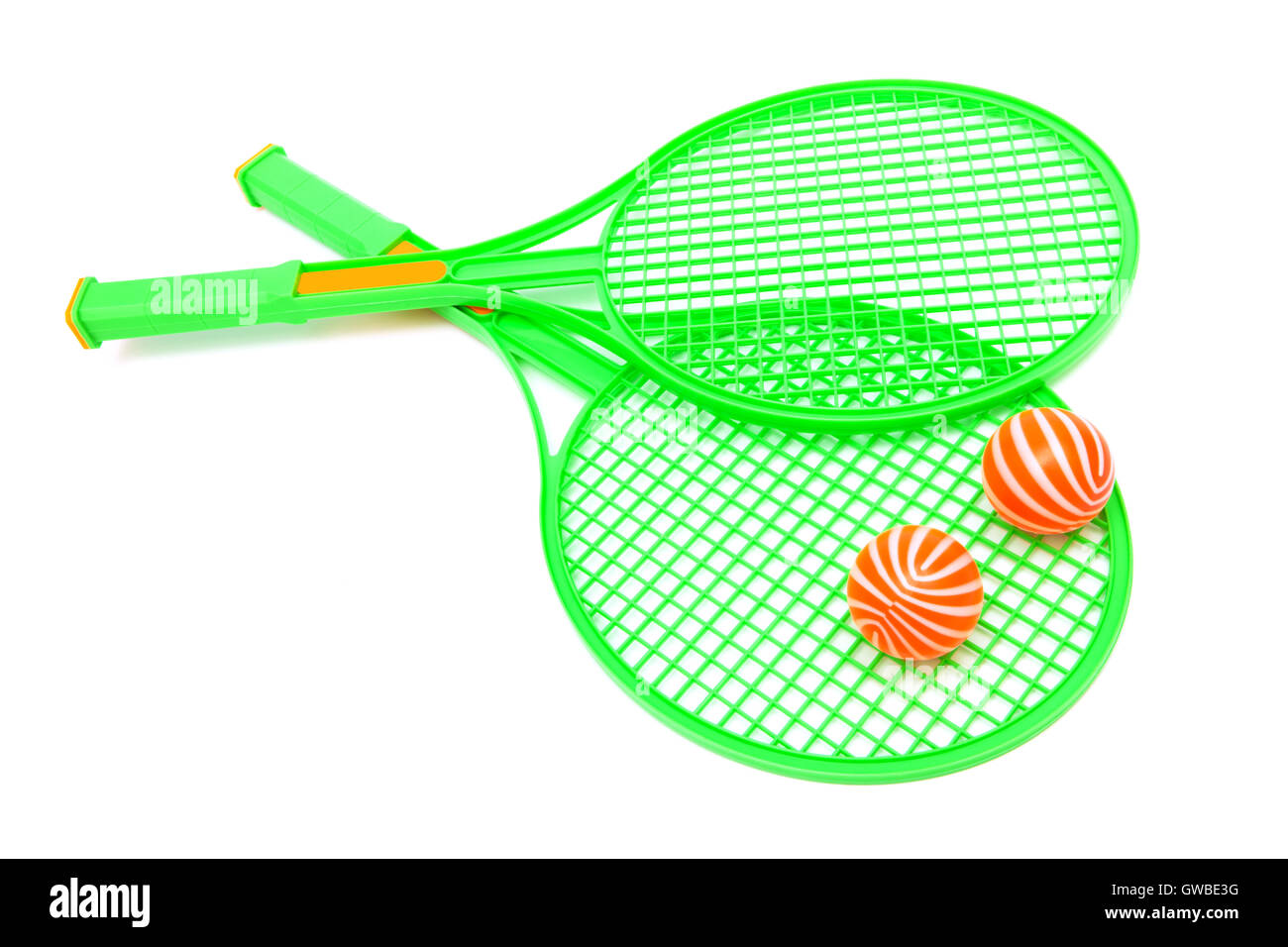 green racket and ball on a white background Stock Photo - Alamy