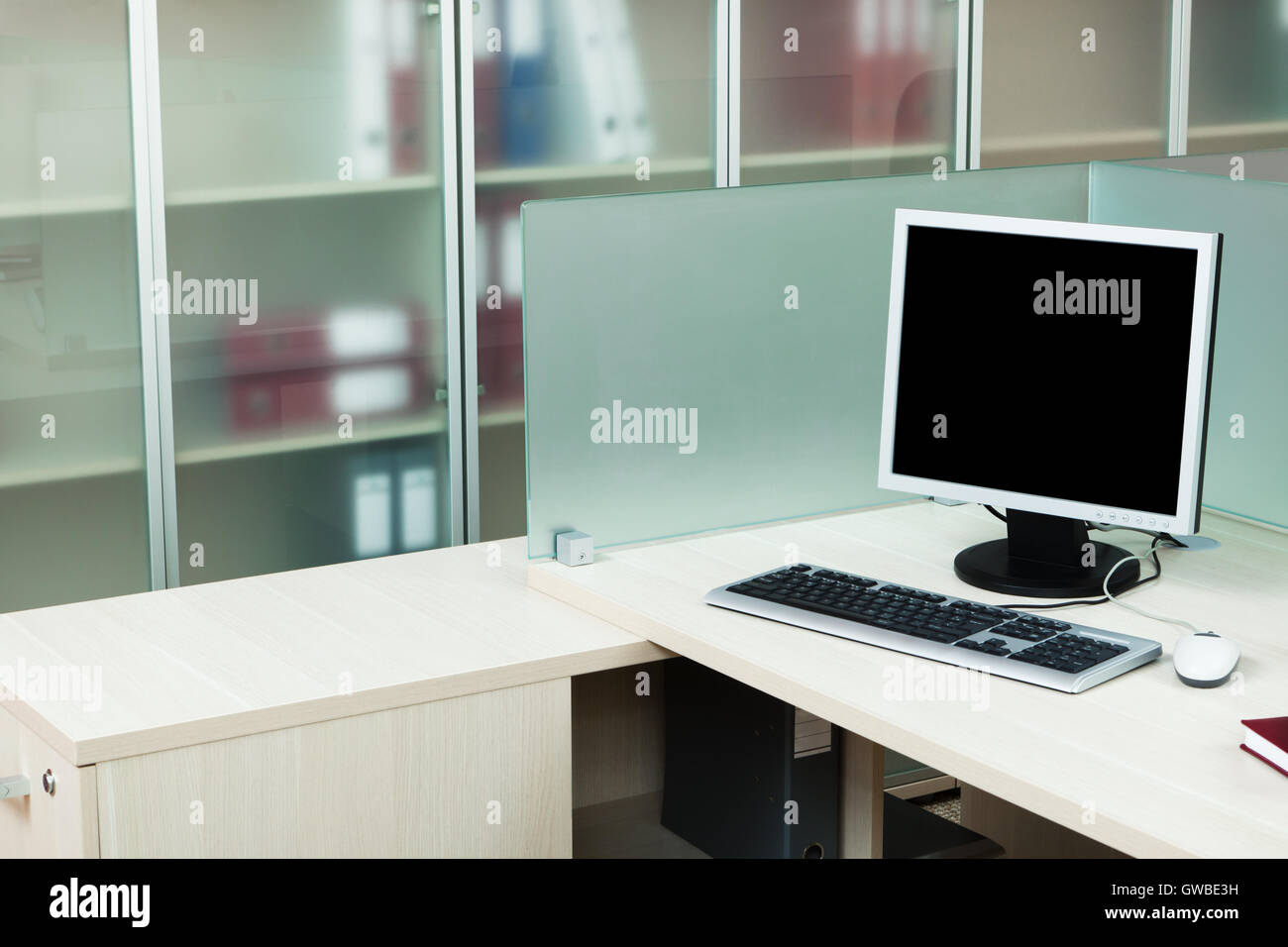 computer on a desk in a modern office Stock Photo - Alamy