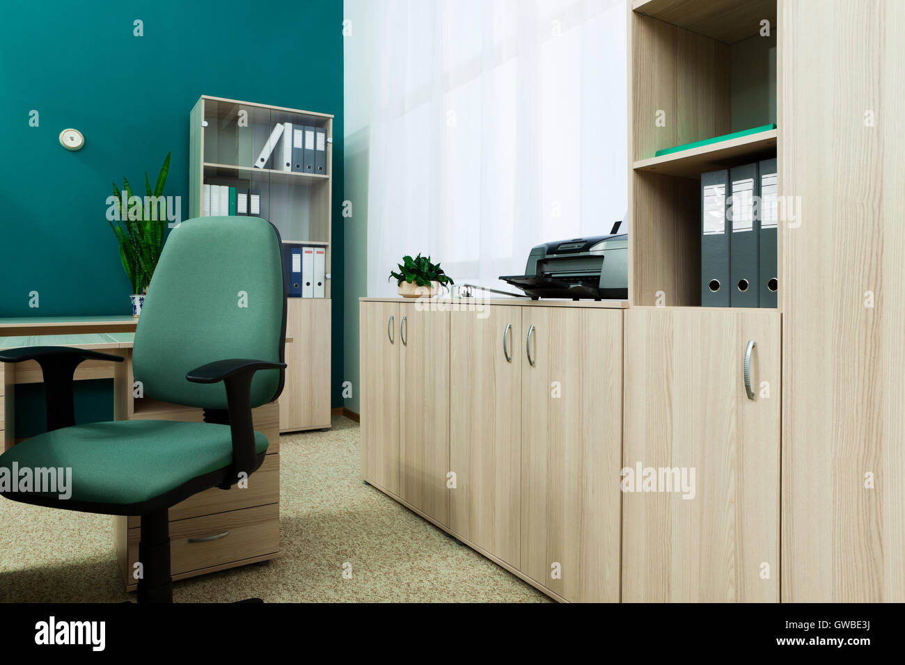 printer on a desk in a modern office Stock Photo - Alamy