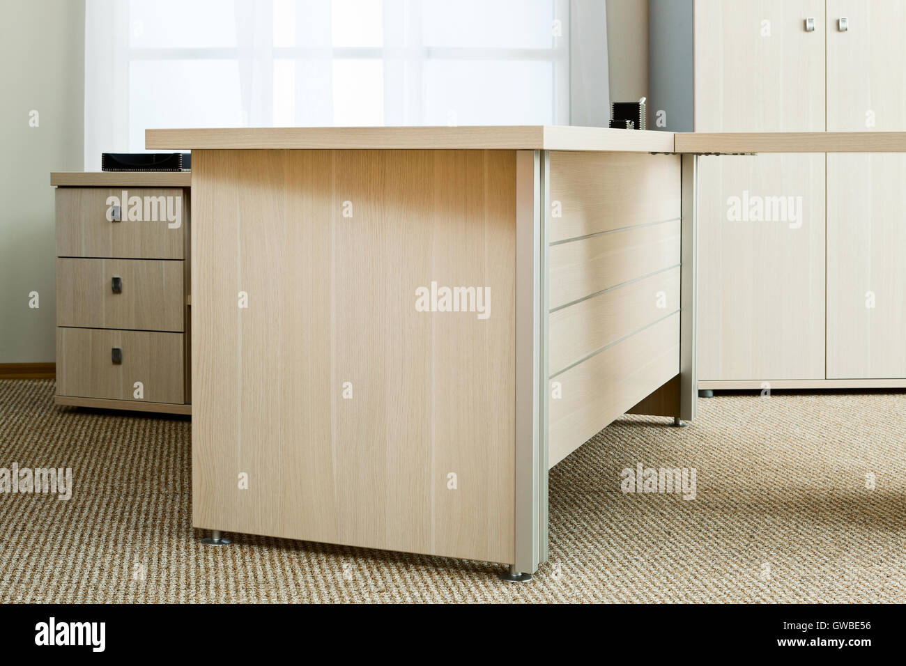 new desk with drawers in a modern office Stock Photo - Alamy