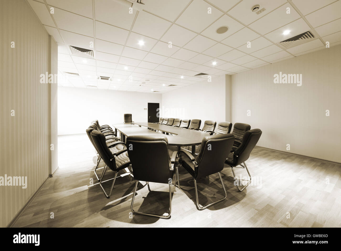 a large table and chairs in a modern conference room Stock Photo - Alamy