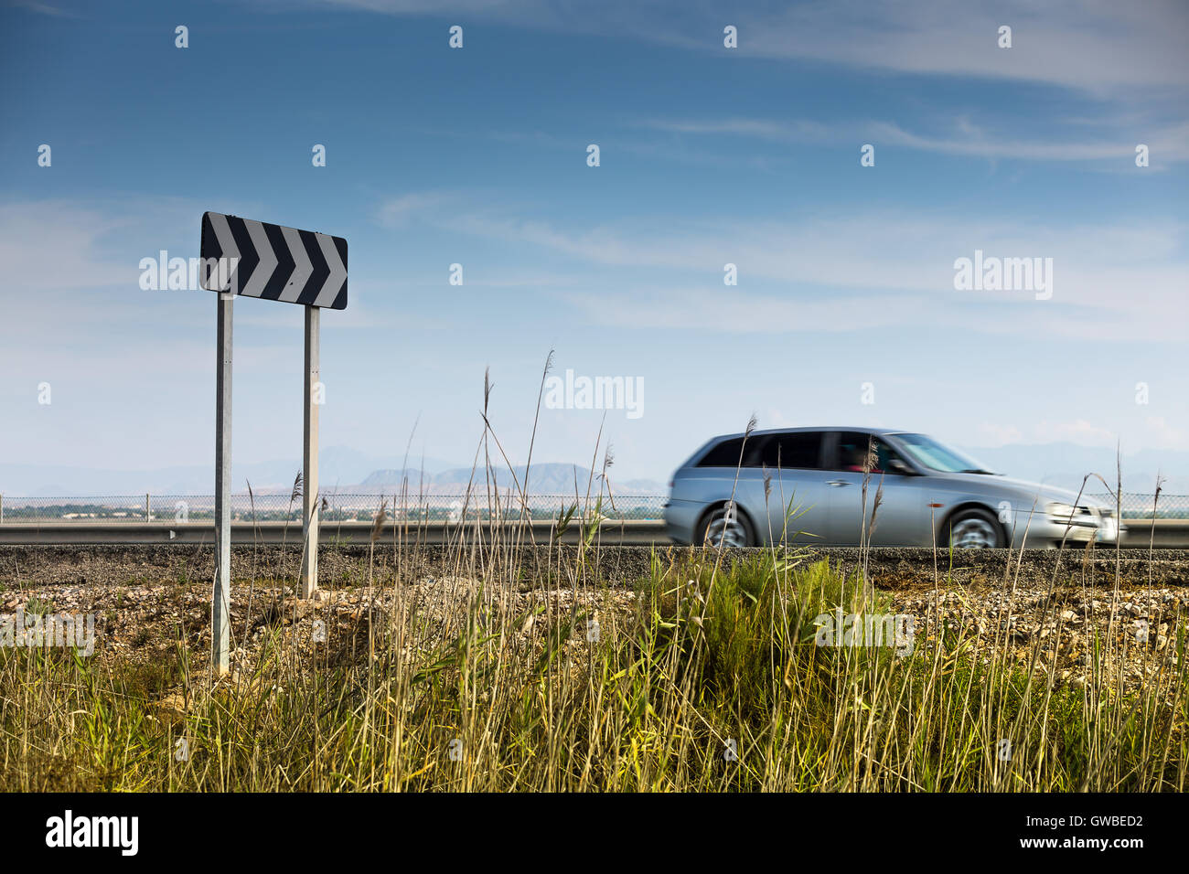 Traffic Curve Sign on the highway Stock Photo - Alamy