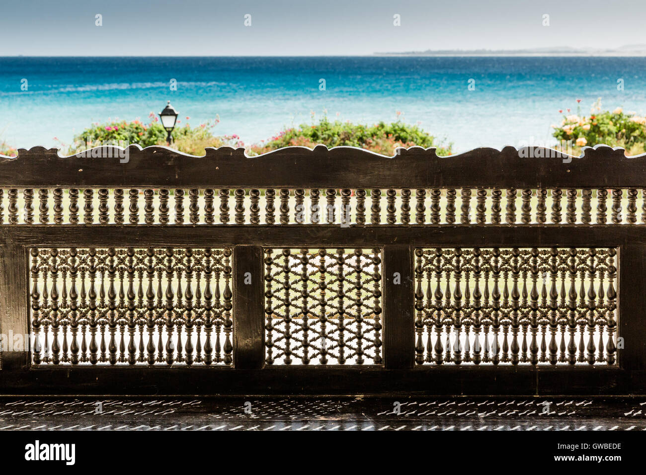 Carved bench in arabic style and the sea on back Stock Photo - Alamy