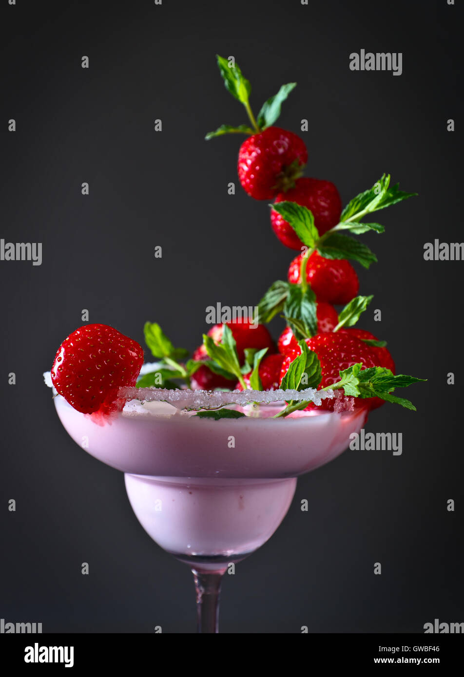 strawberry cocktail with berries and peppermint leaves Stock Photo - Alamy