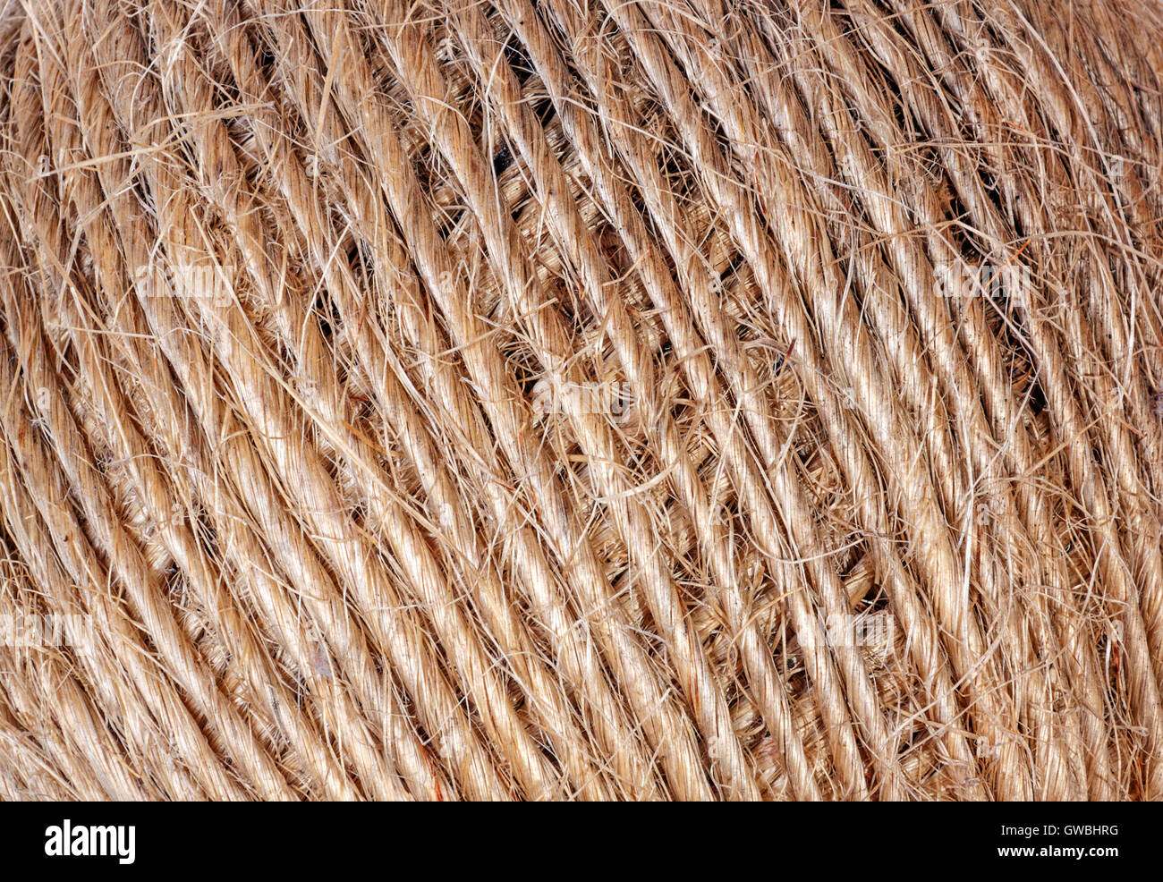 Extreme close up of coiled patterns and textures on roll of string ...