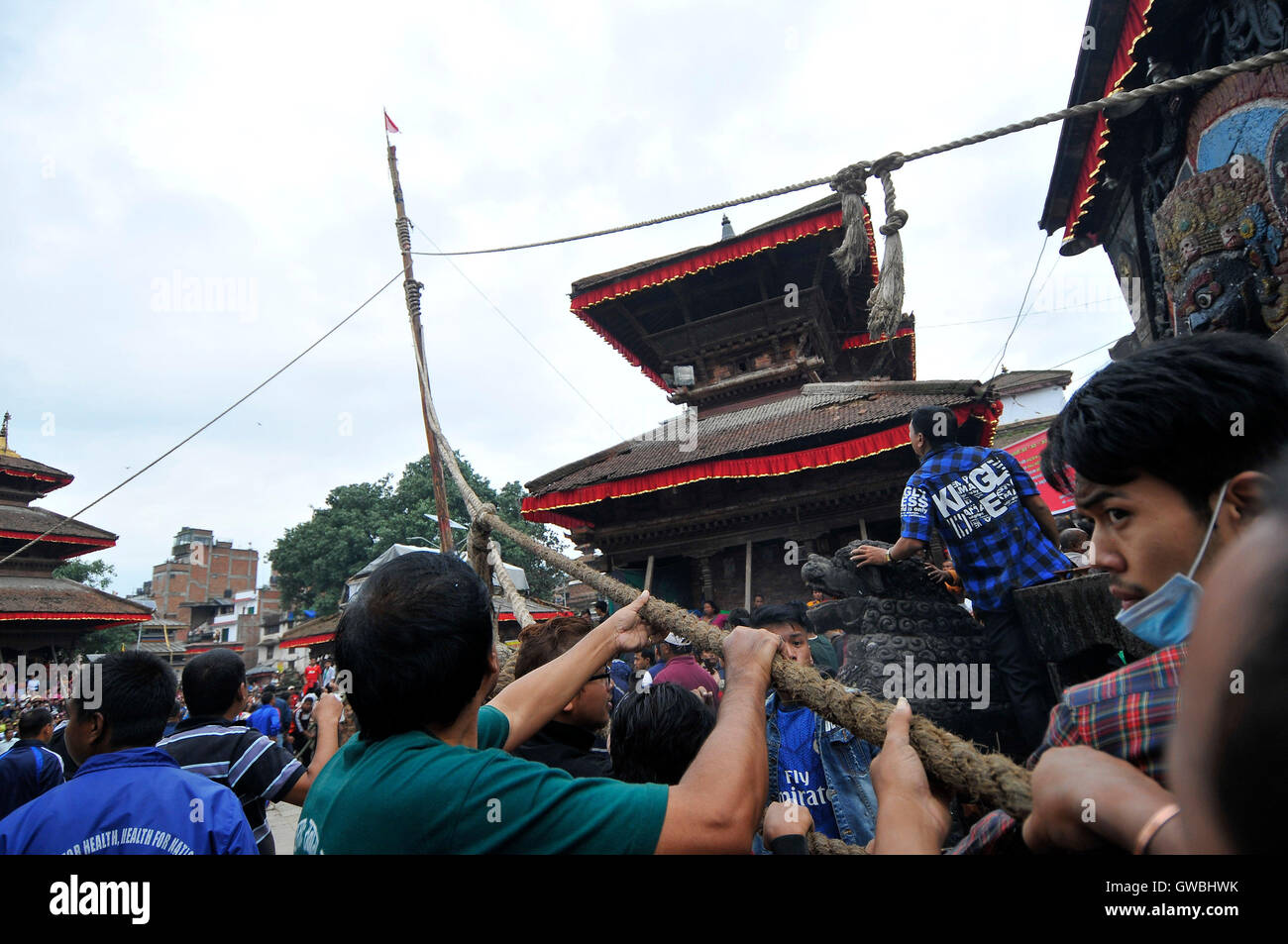 Kathmandu, Nepal. 13th Sep, 2016. Nepalese devotees pulling rope to ...